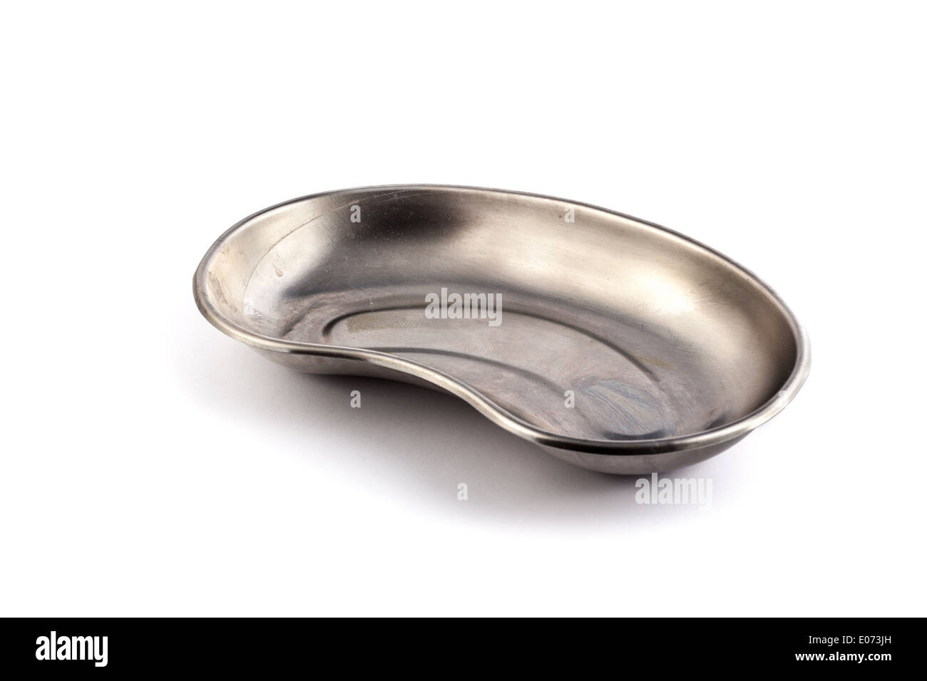 a stainless steel surgical tray isolated over white Stock Photo - Alamy