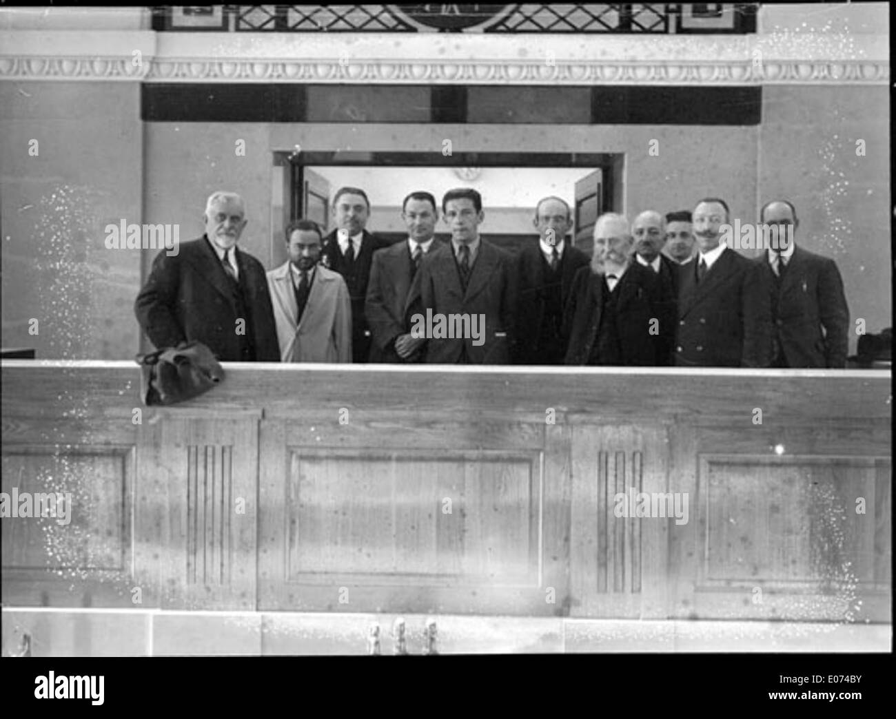 This historical photograph captures the officials at the inauguration ...
