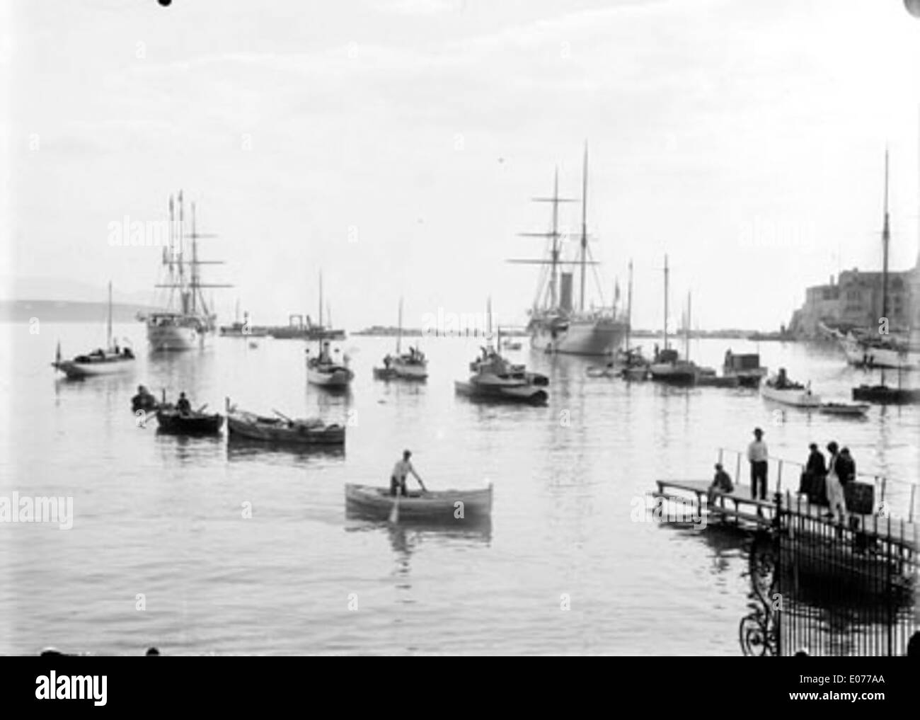 This 1905 painting titled *Le Port, Monaco* depicts the bustling harbor ...
