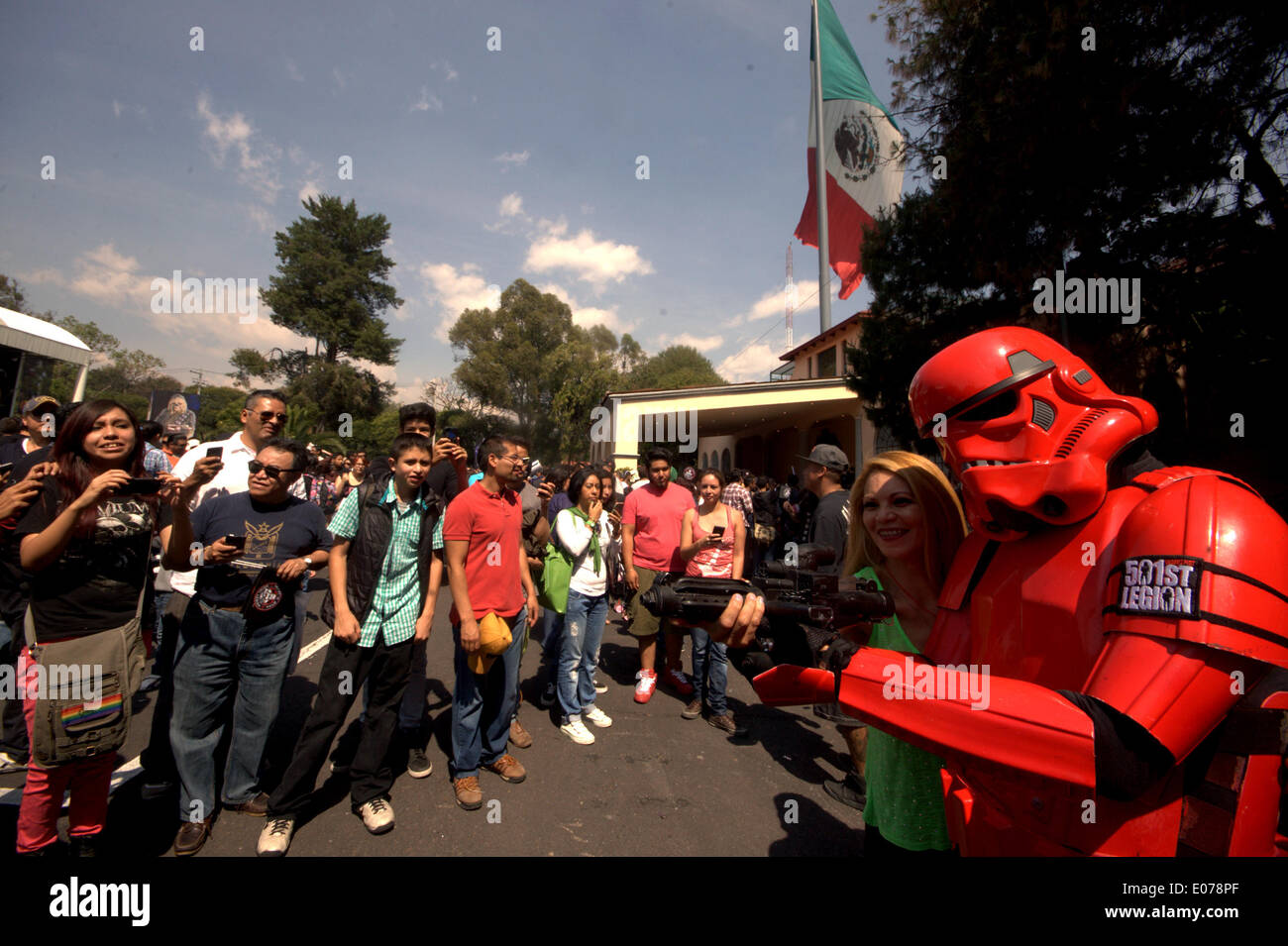 Mexico City, Mexico. 4th May, 2014. A woman poses next to a person ...