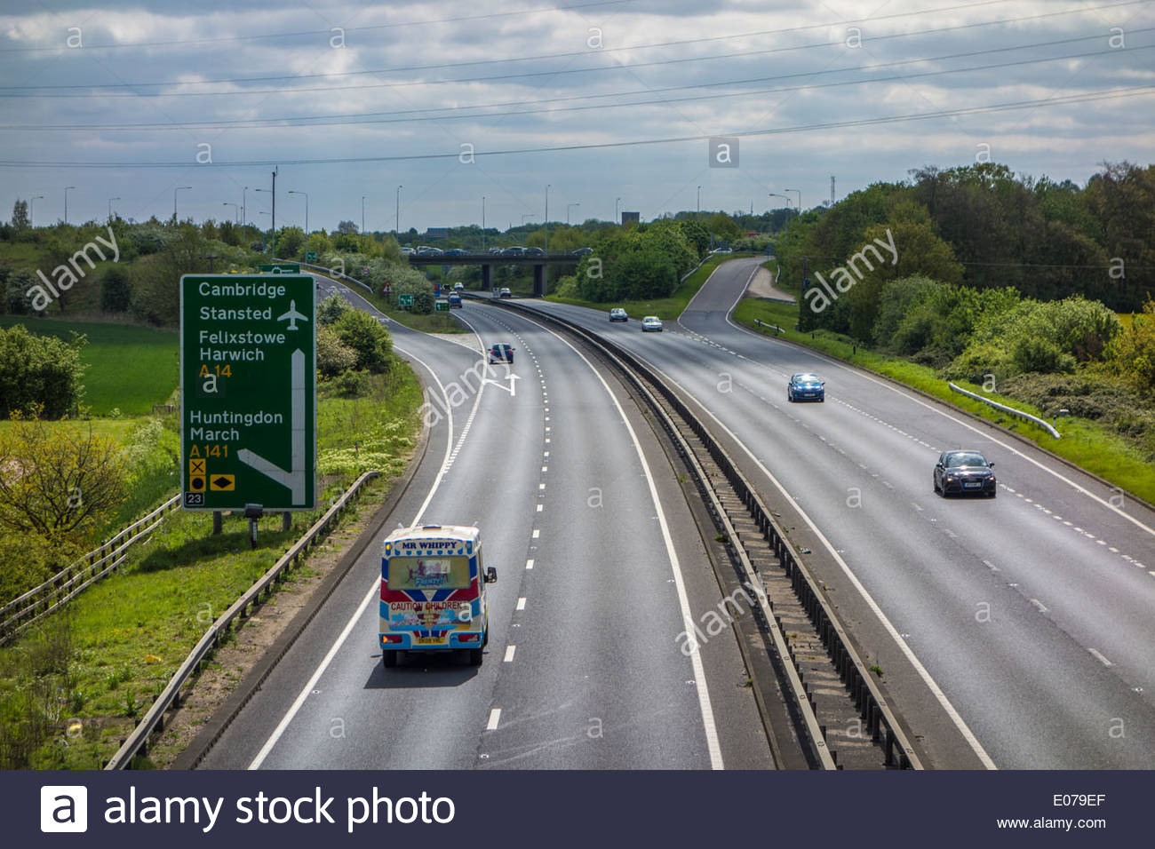 The A14 dual carriageway near Huntingdon, with signpost to Cambridge ...