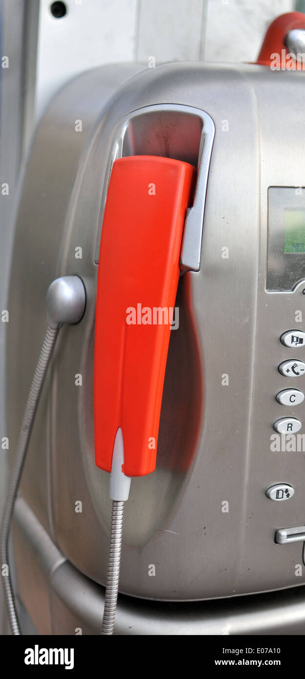 red handset of a public telephone Stock Photo - Alamy