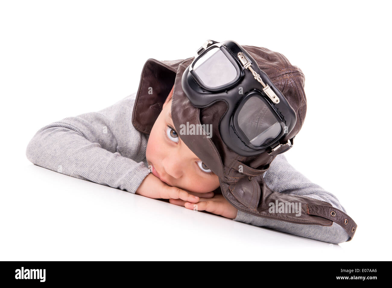 Young boy with pilot helmet isolated in white Stock Photo - Alamy