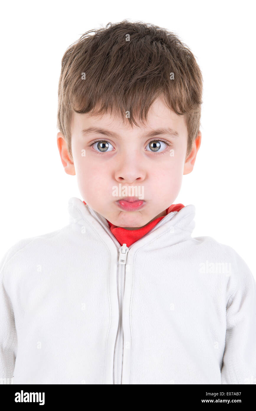 Young boy making faces isolated in white Stock Photo - Alamy