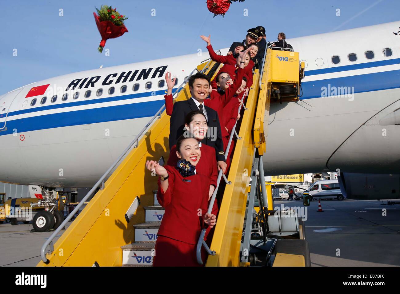 Vienna. 5th May, 2014. Crew members of Air China Flight CA841 pose for ...