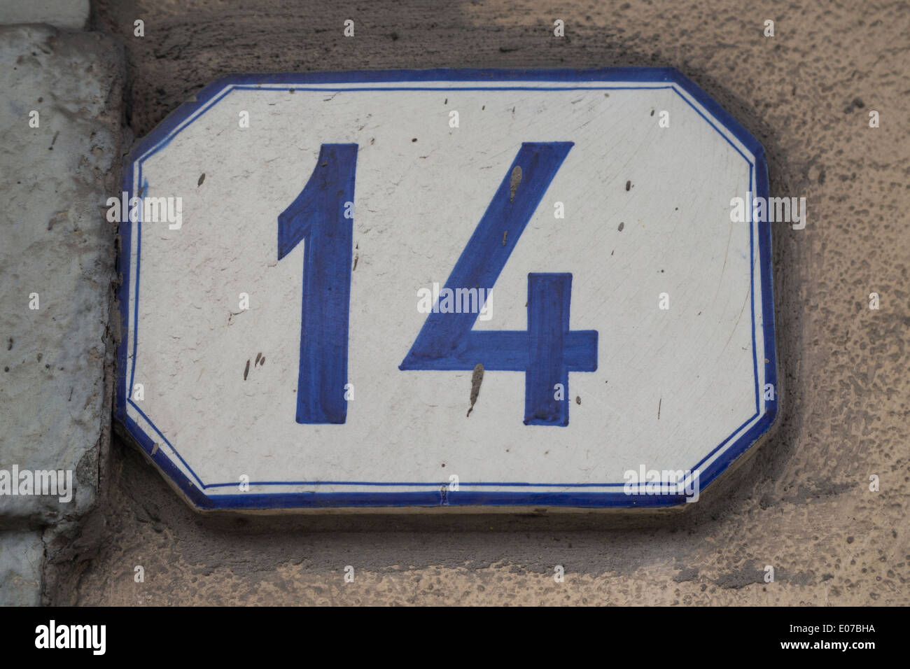 Door number on a wall Stock Photo - Alamy
