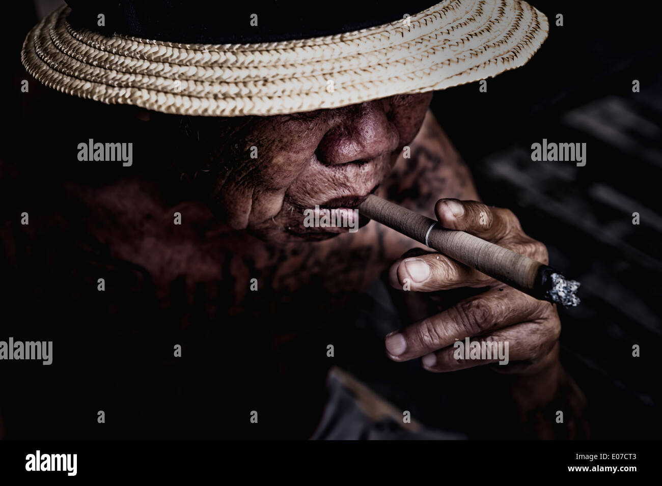 very old Man smoke a cigarette Stock Photo - Alamy