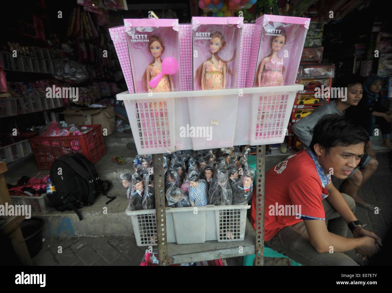 Jakarta, Indonesia. 5th May, 2014. A toy vendor waits for customers at ...