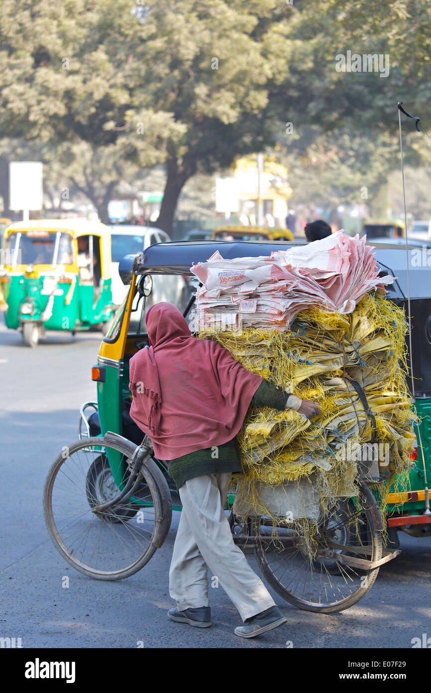Pushing a heavy load hi-res stock photography and images - Alamy