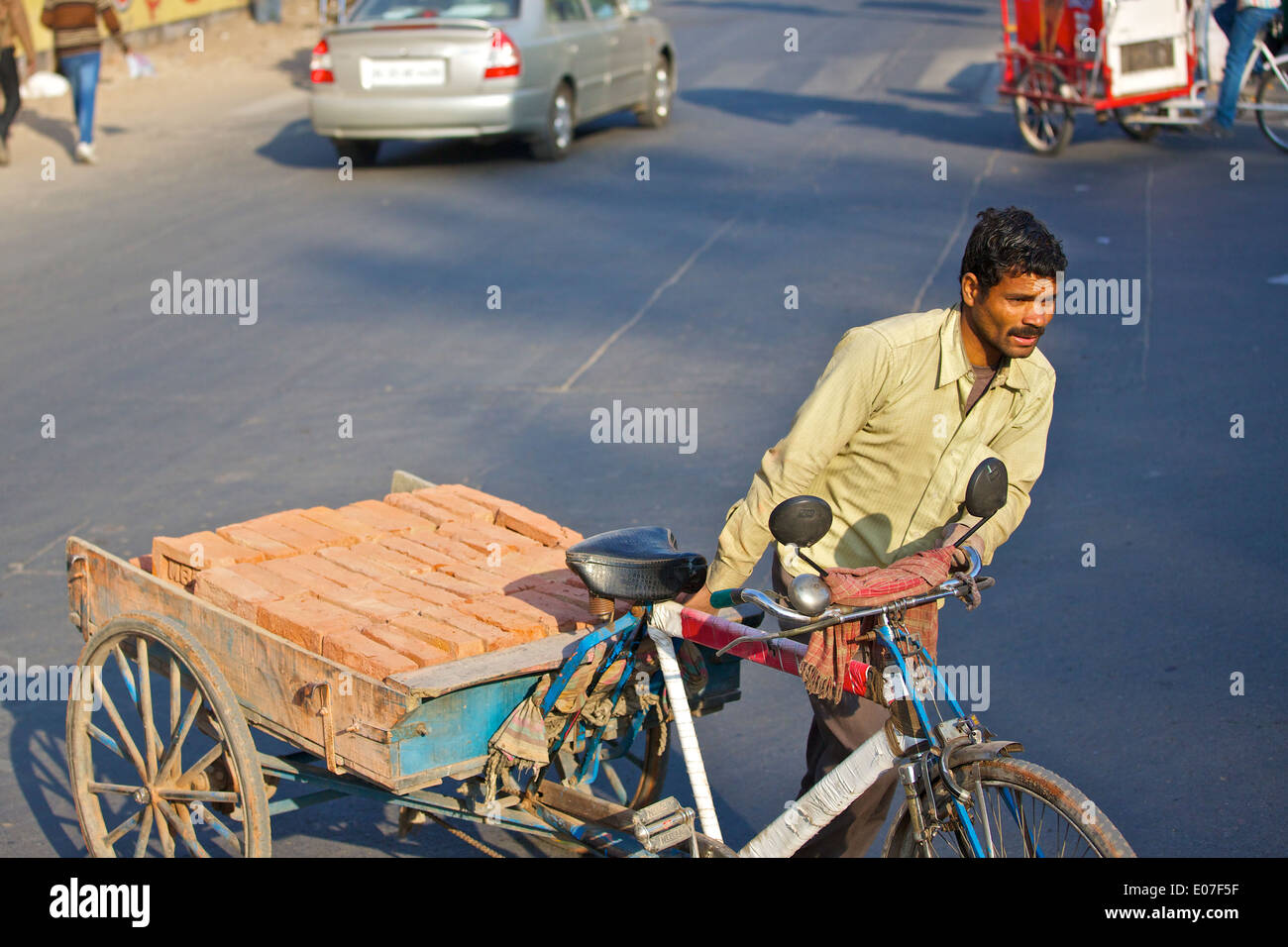 Indian man with cycle hi-res stock photography and images - Alamy