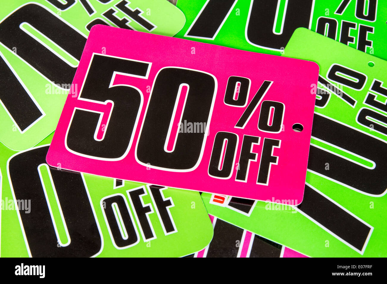 Lots of colorful sale tags lying on the surface Stock Photo - Alamy
