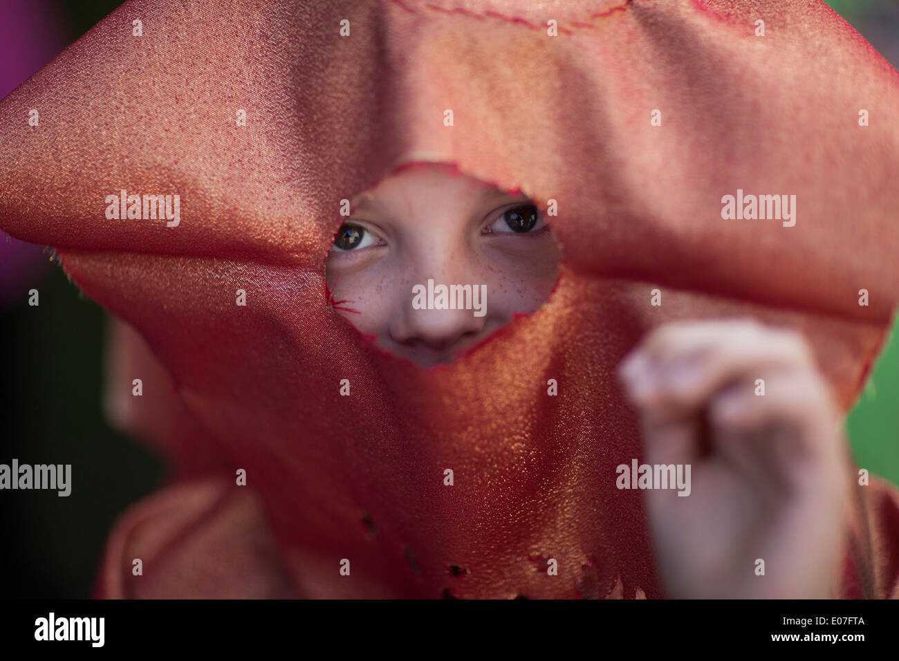 Little boy wearing hood over head Stock Photo - Alamy