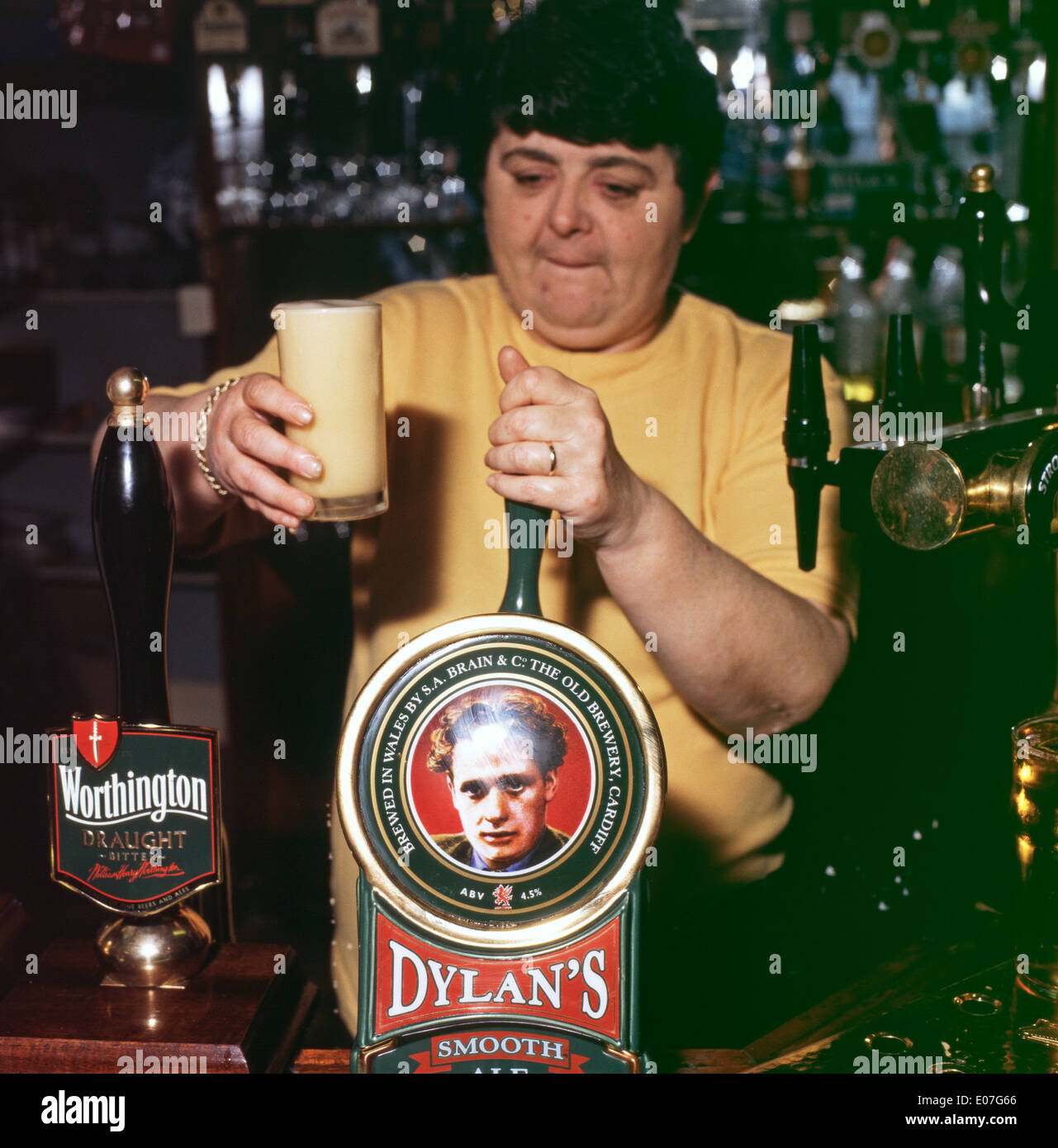 Mrs Watts wife of Tommy Watts pulling a pint of (Dylan Thomas) Dylan's ...