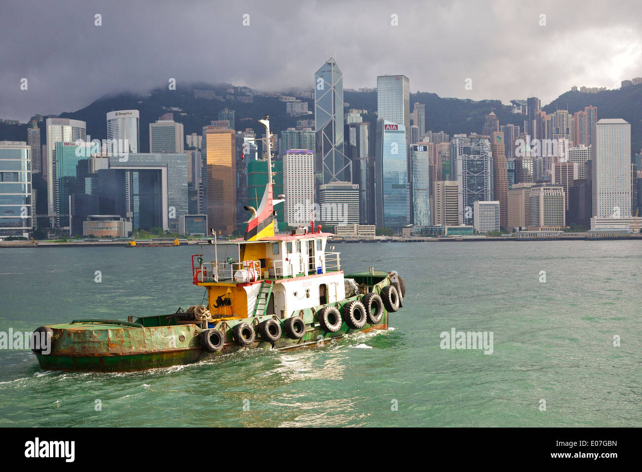 A Tug and the City, Battered Tug off Tsim Sha Tsui, Victoria Harbour ...