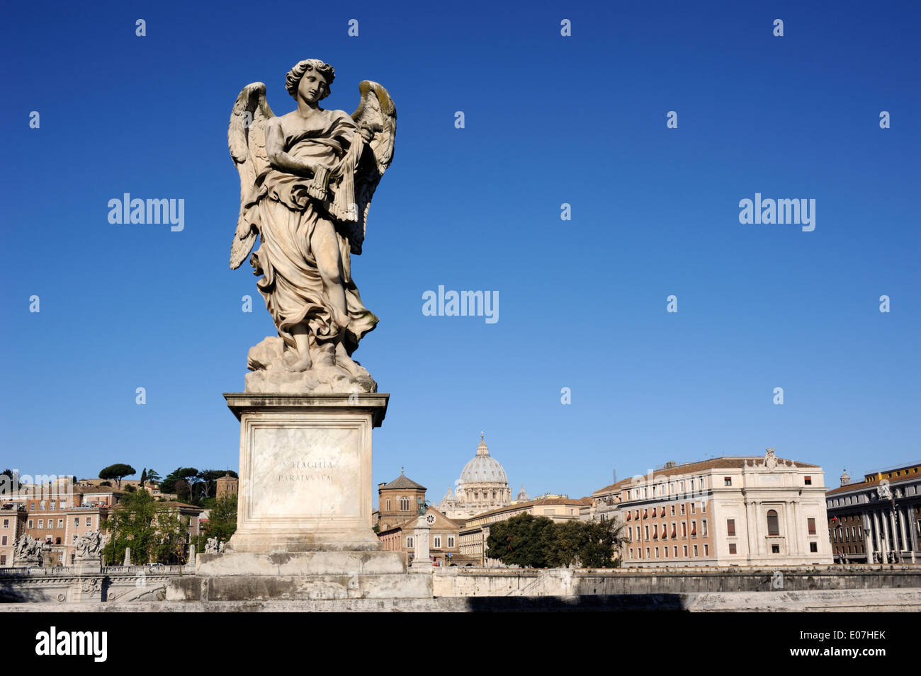 Italy, Rome, angel statue on Sant'Angelo bridge and St. Peter basilica ...