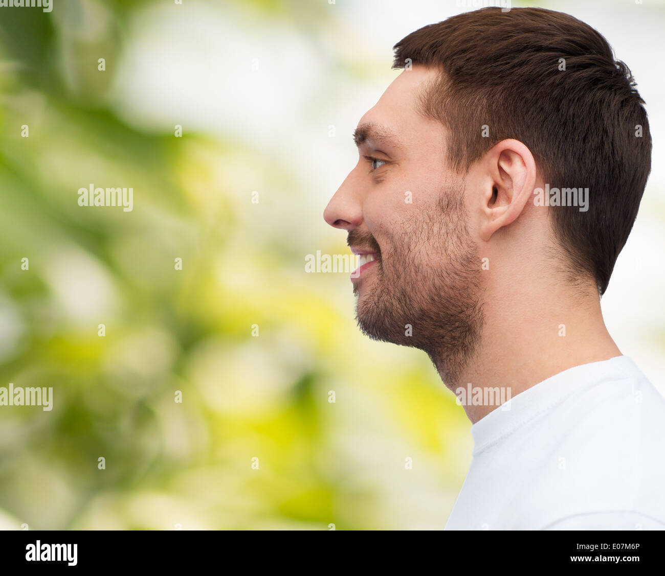 Handsome smiling man face profile hi-res stock photography and images ...