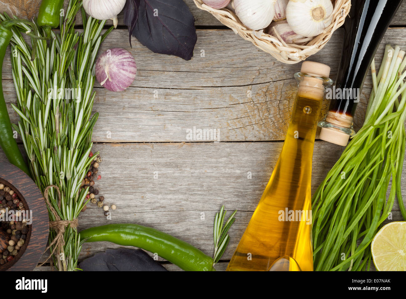 Herbs, spices and seasoning over wooden table background with copy ...