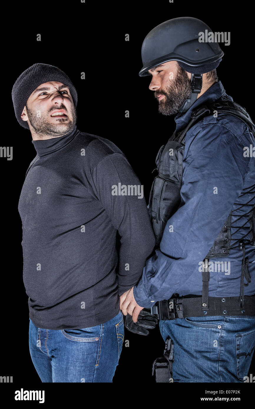 Cop wearing swat tactical vest hi-res stock photography and images - Alamy