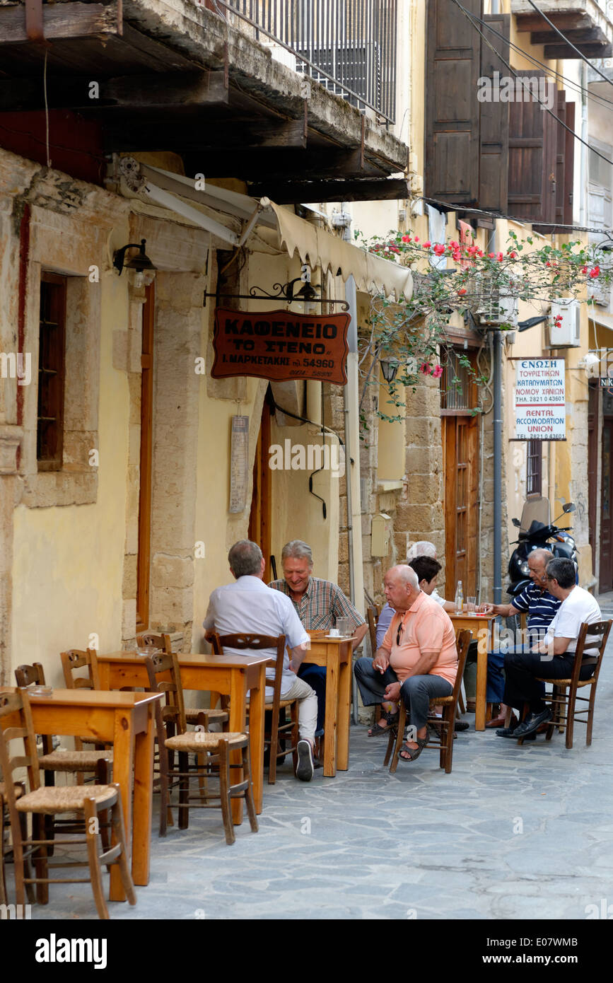 Group men at Greek outdoor café some playing backgammon others are ...