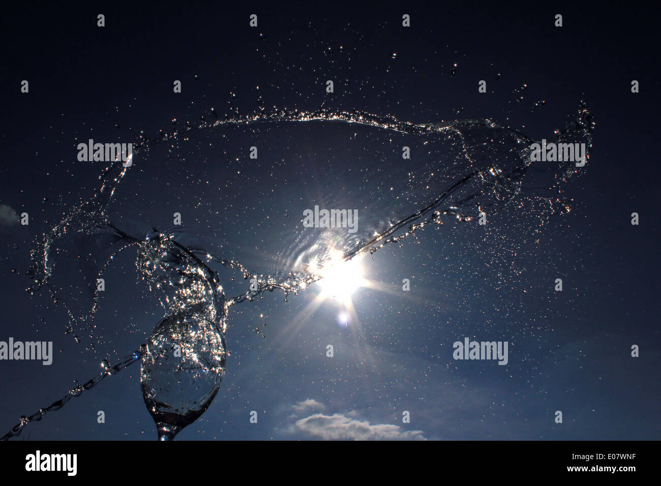 Water splashing from wine glass Stock Photo - Alamy