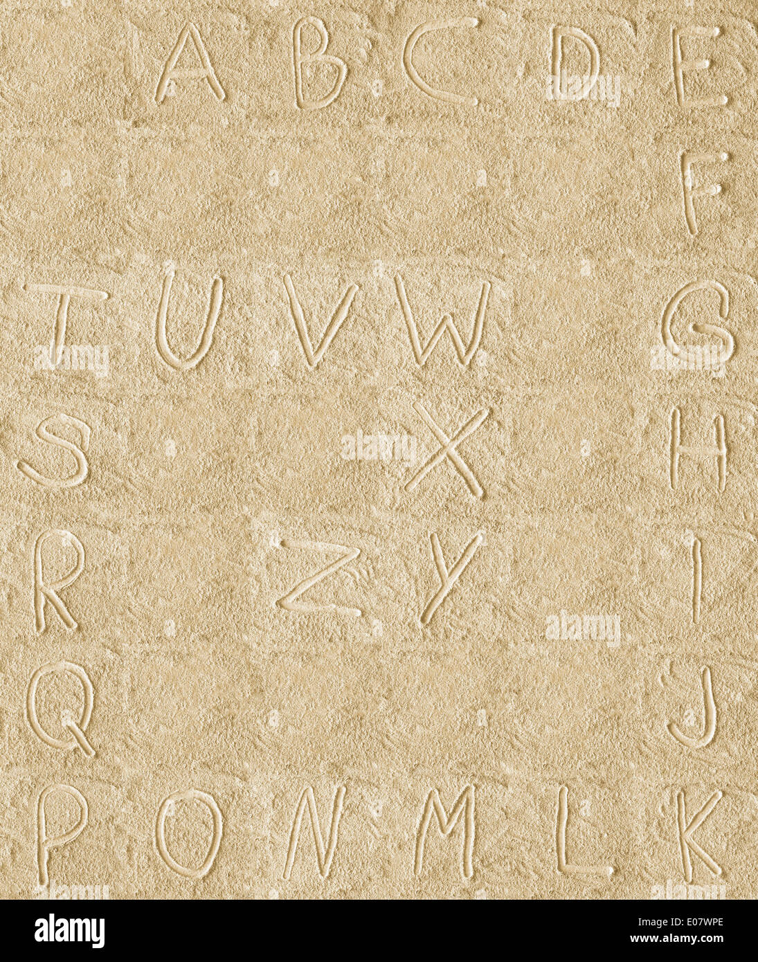 Alphabet writing on sand letter hi-res stock photography and images - Alamy