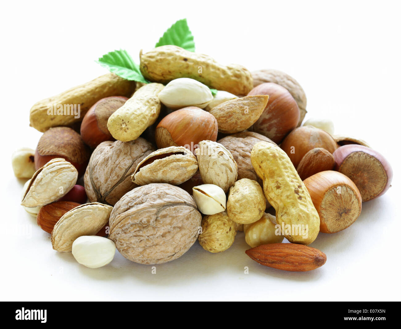 mix nuts - walnuts, hazelnuts, almonds, peanuts, pistachios on a white ...
