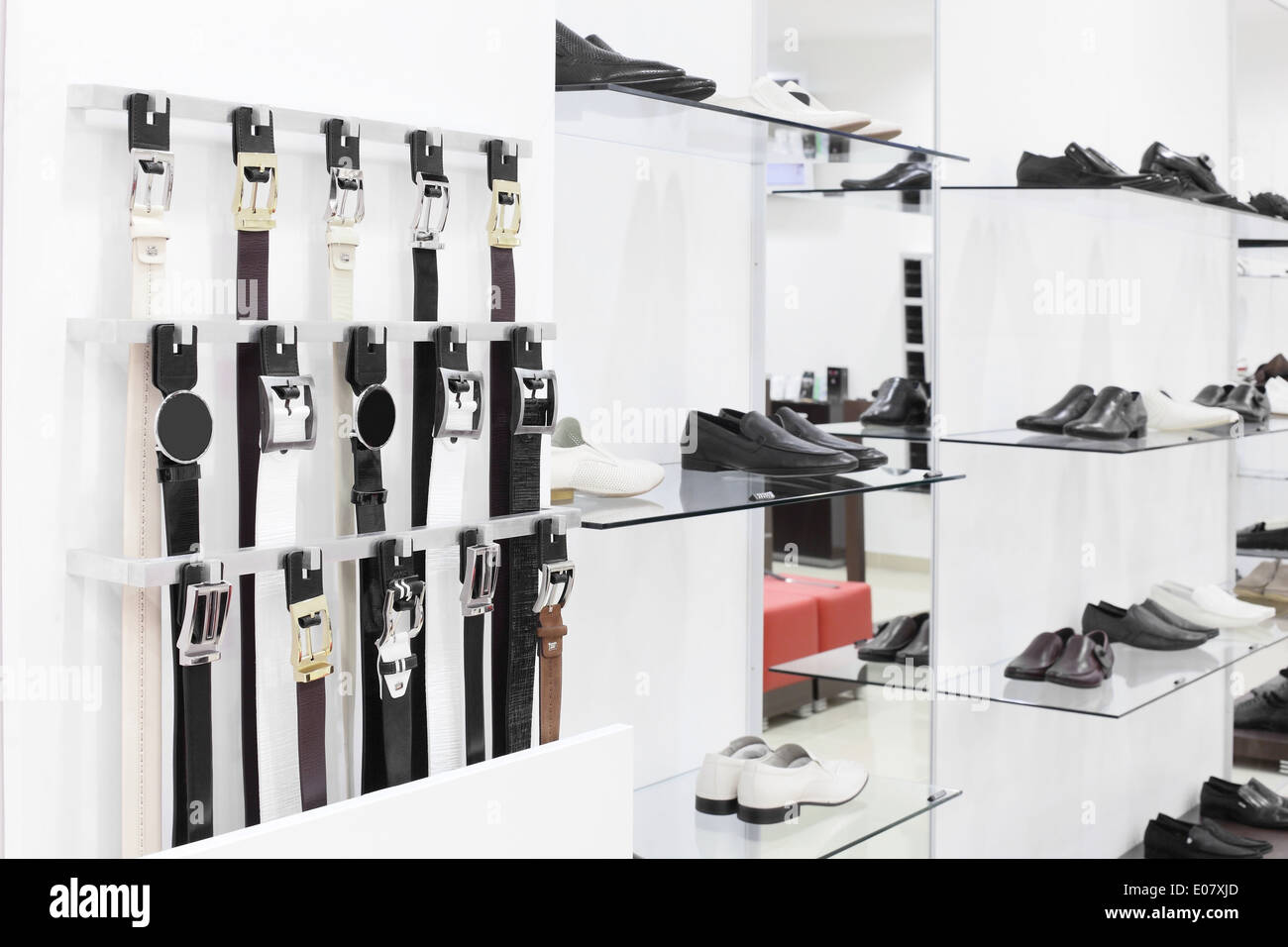 clean and bright luxury european shoes store Stock Photo - Alamy