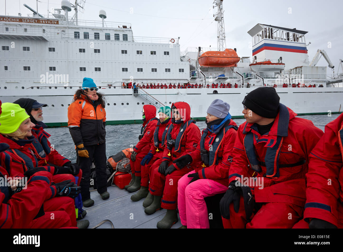 passengers on board a zodiac excursion leaving research ship in ...