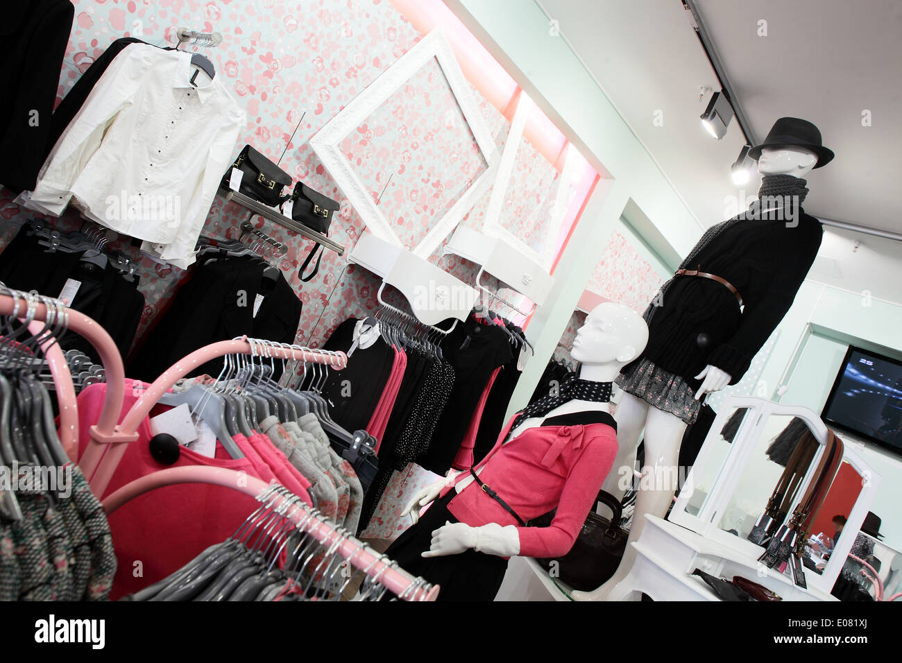 european clothing store interior in modern mall Stock Photo - Alamy