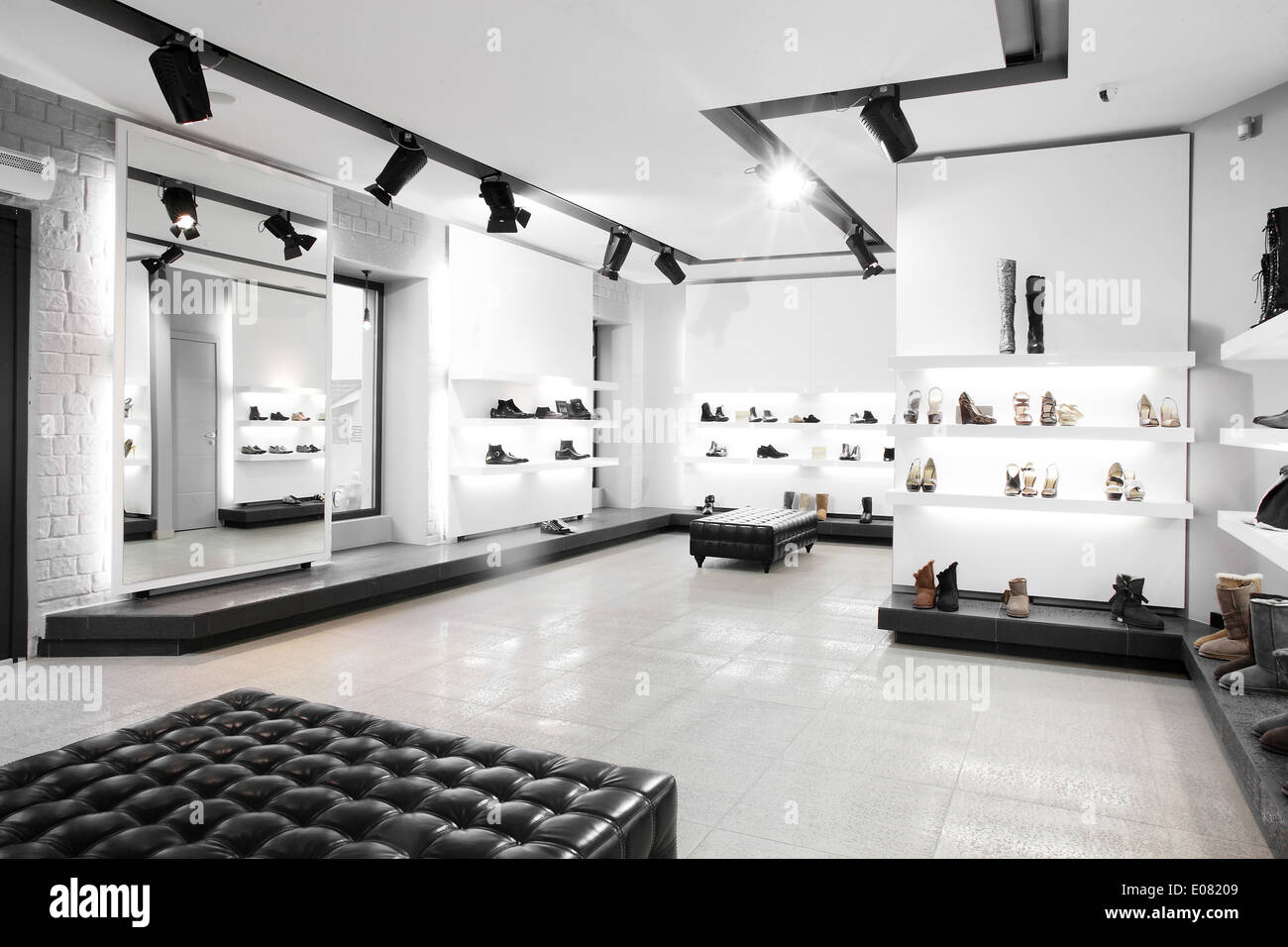 Bright large shoe store with new collection Stock Photo - Alamy