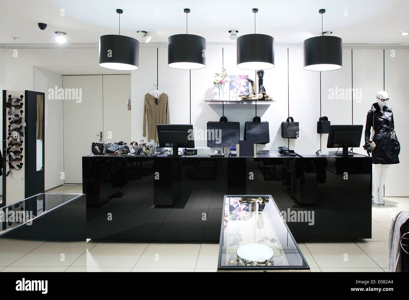 european clothing store interior in modern mall Stock Photo - Alamy