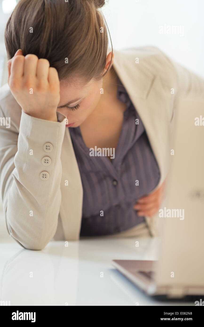 Portrait of stressed business woman at work Stock Photo - Alamy