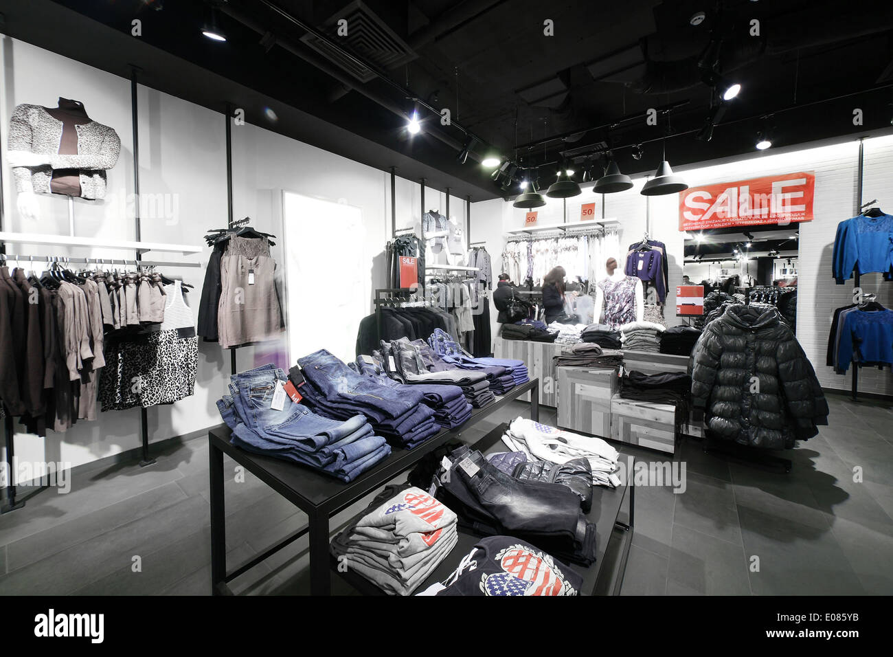 european clothing store interior in modern mall Stock Photo - Alamy