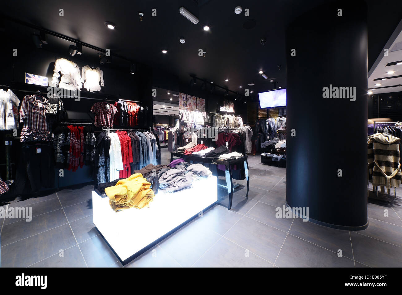 european clothing store interior in modern mall Stock Photo - Alamy