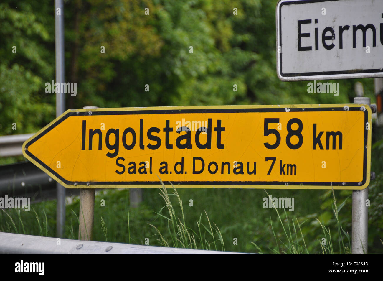 Road sign indicating Igolstadt 58 kms away Stock Photo - Alamy