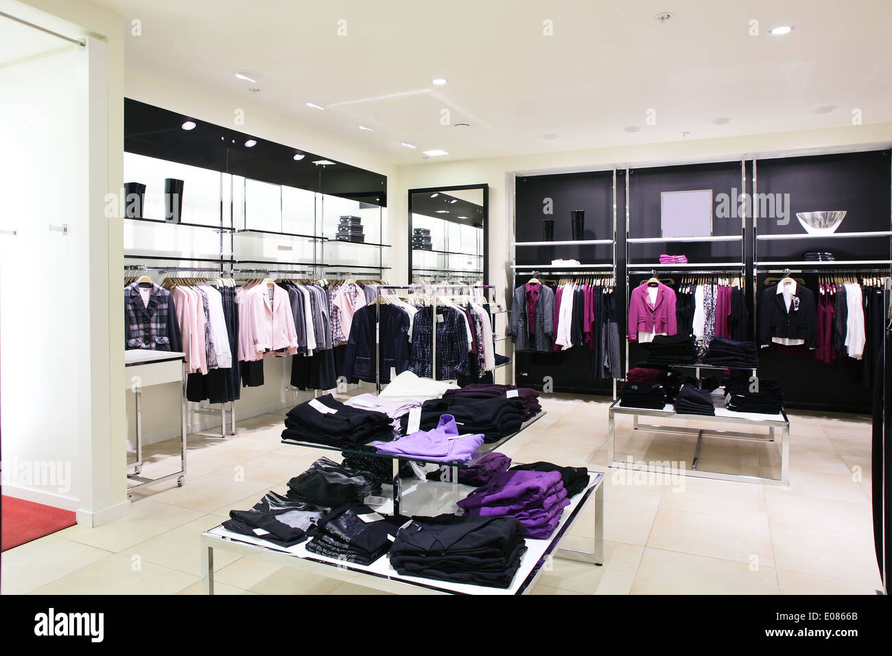 luxury and fashionable brend new interior of cloth store Stock Photo ...