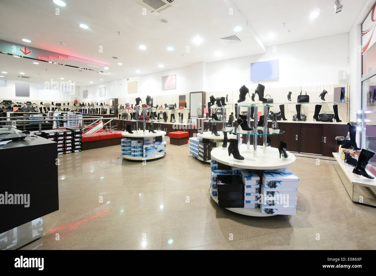 bright and fashionable interior of shoe store in modern mall Stock ...