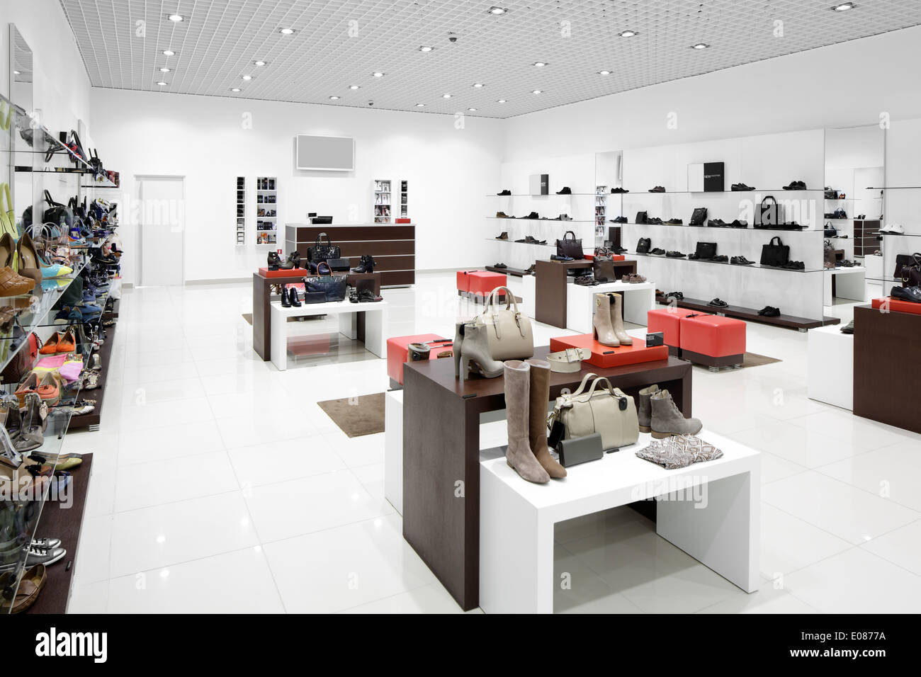 bright and fashionable interior of shoe store in modern mall Stock ...