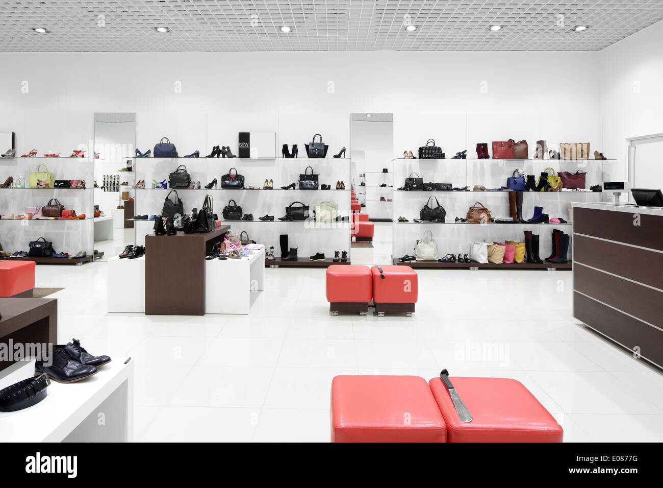bright and fashionable interior of shoe store in modern mall Stock ...
