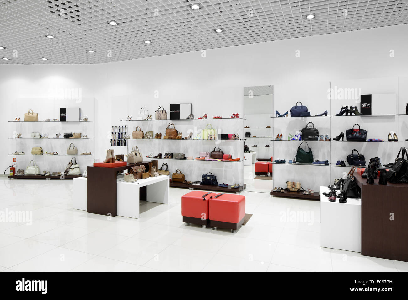 bright and fashionable interior of shoe store in modern mall Stock ...