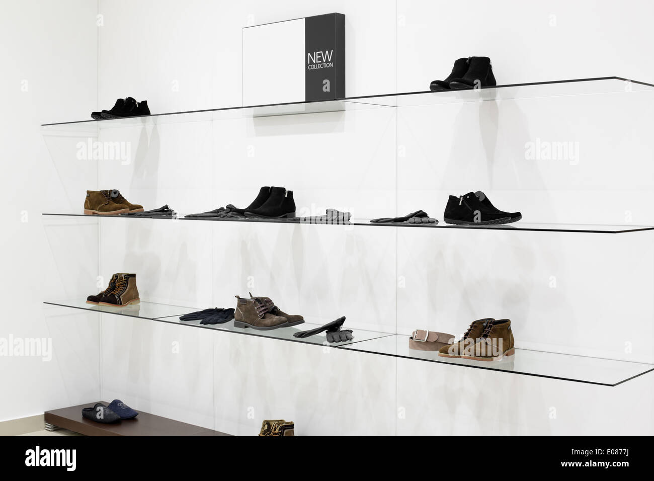 bright and fashionable interior of shoe store in modern mall Stock ...