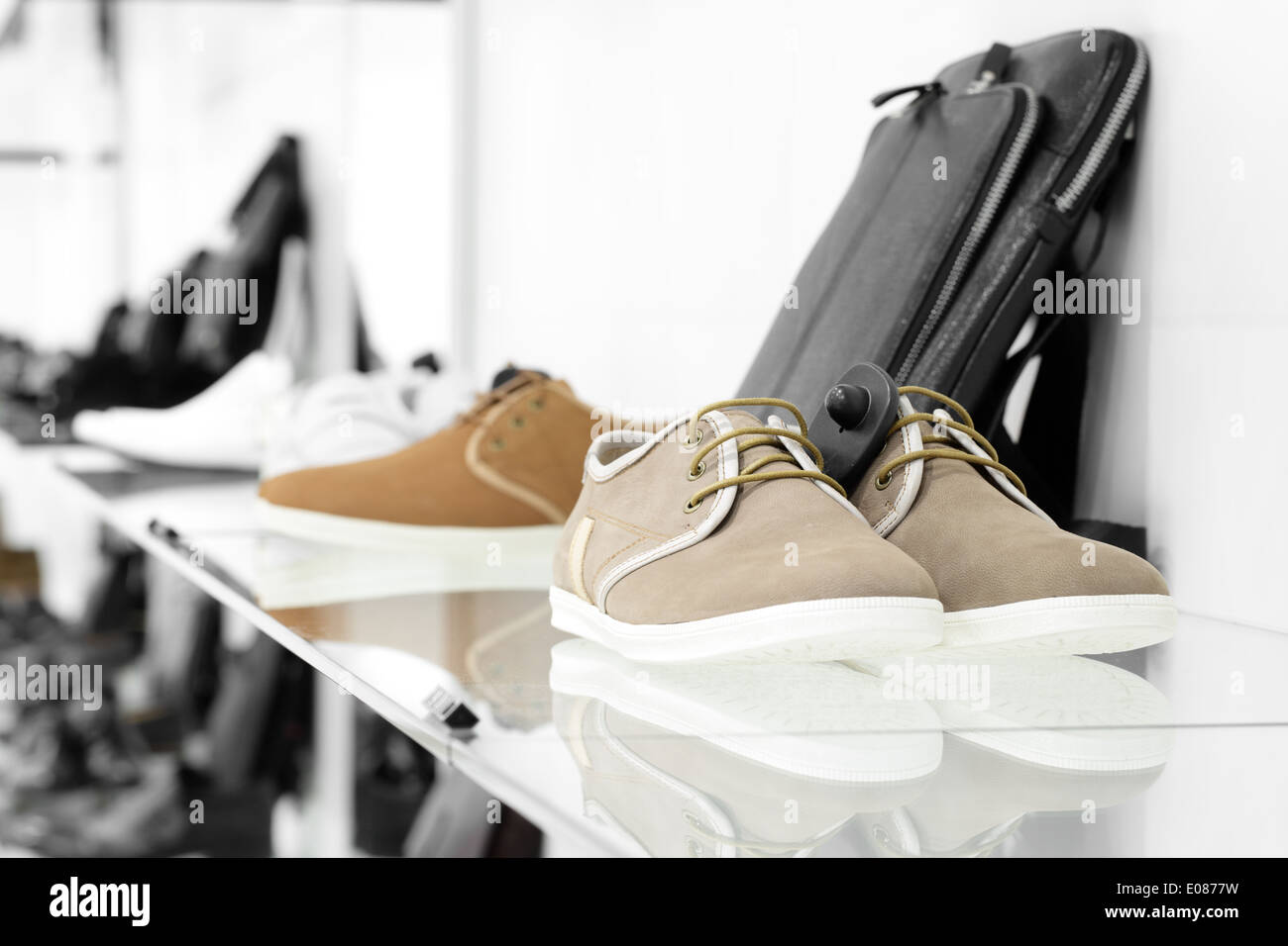 bright and fashionable interior of shoe store in modern mall Stock ...