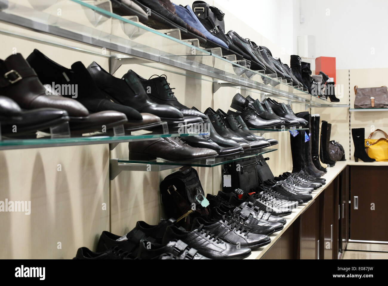 bright and fashionable interior of shoe store in modern mall Stock ...