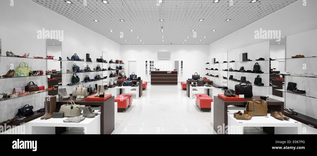 bright and fashionable interior of shoe store in modern mall Stock ...