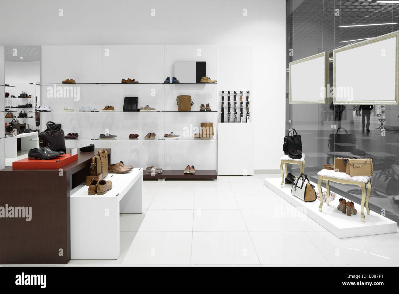 bright and fashionable interior of shoe store in modern mall Stock ...