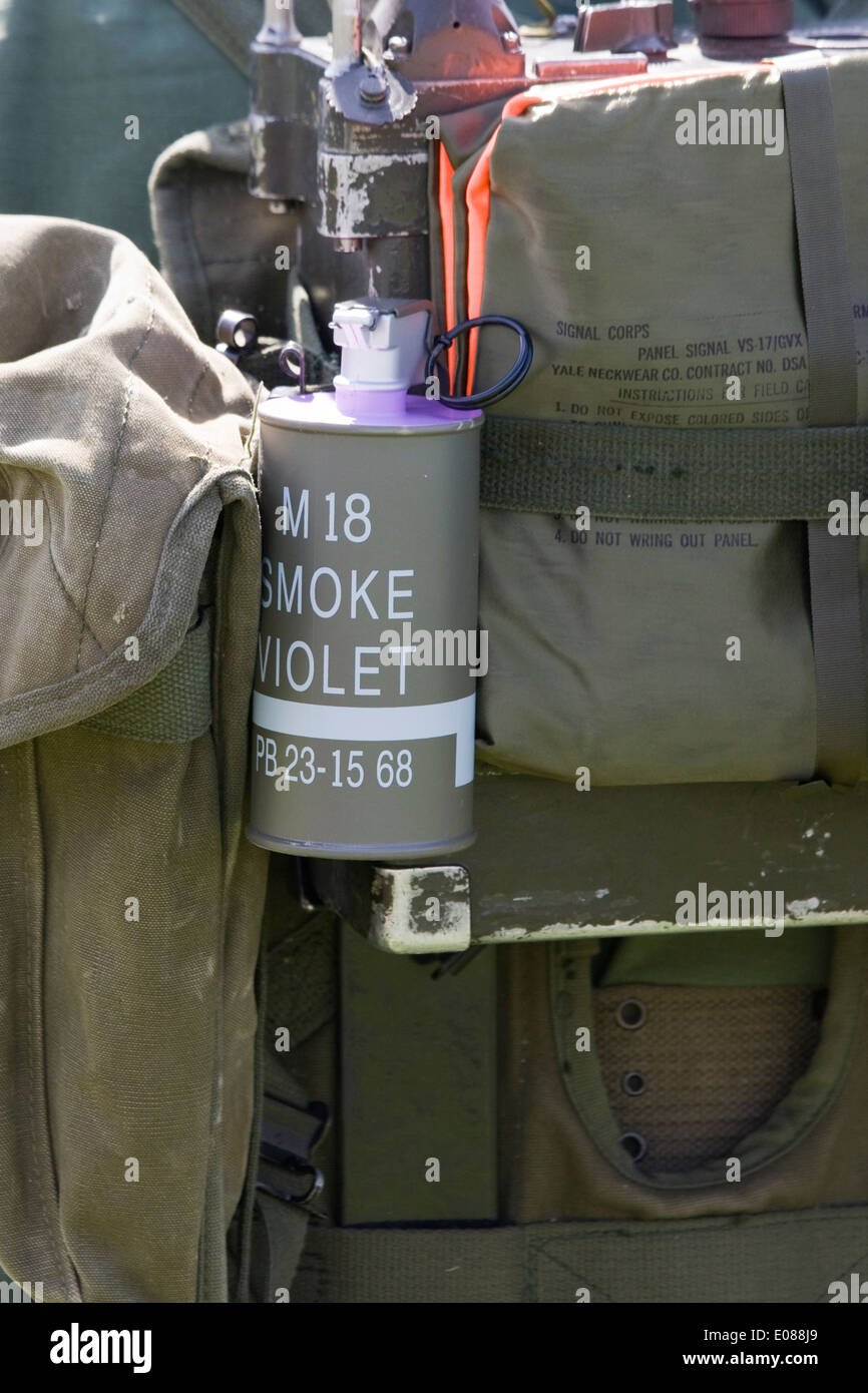 Violet Smoke grenade attached to an armed services rucksack Stock Photo ...