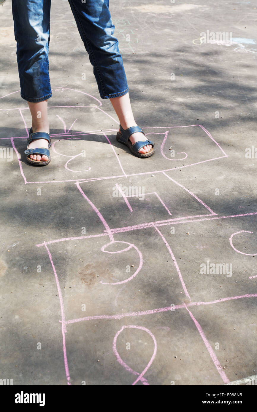 Girl playing hopscotch in hi-res stock photography and images - Alamy
