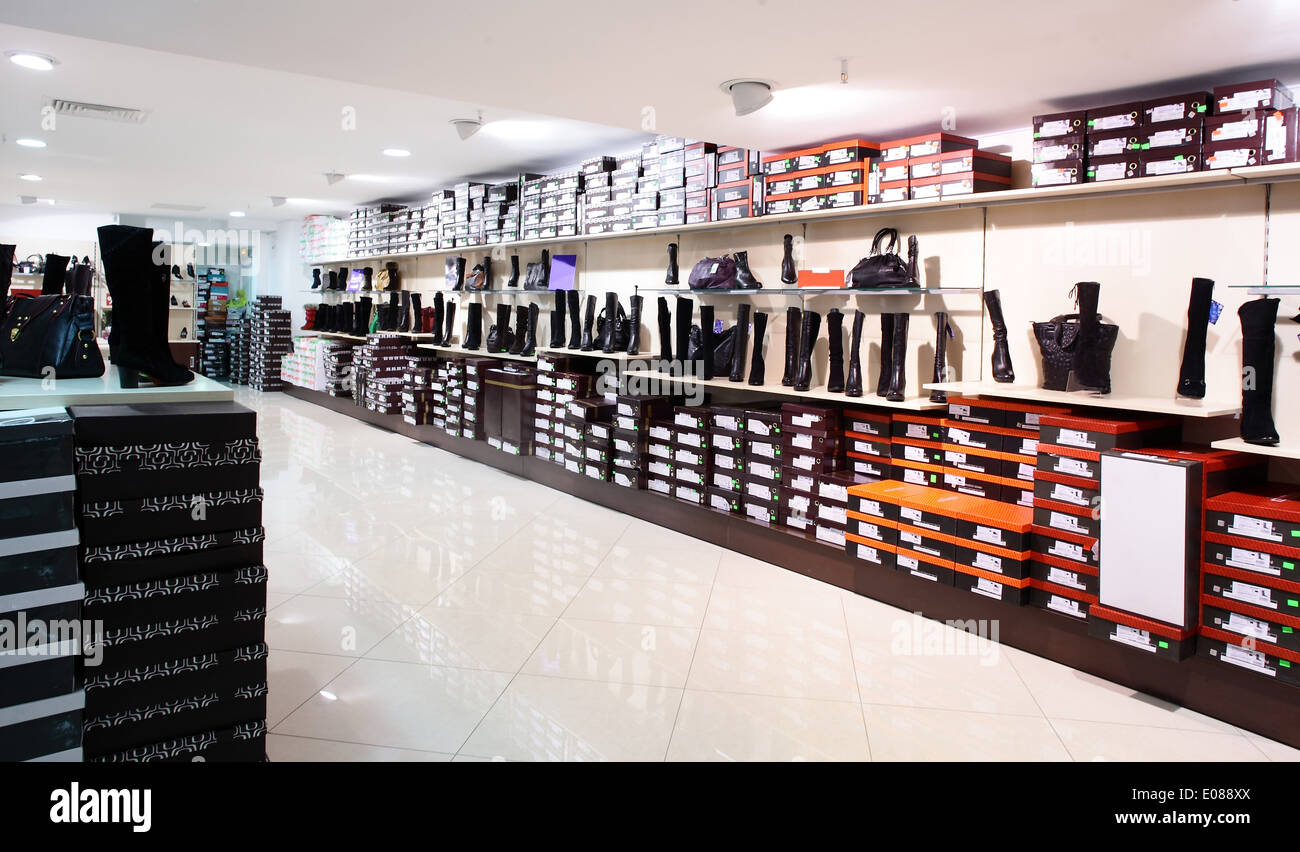 bright and fashionable interior of shoe store in modern mall Stock ...