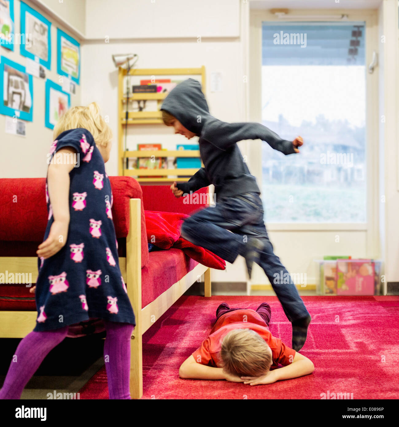 Kids playing in kindergarten Stock Photo - Alamy