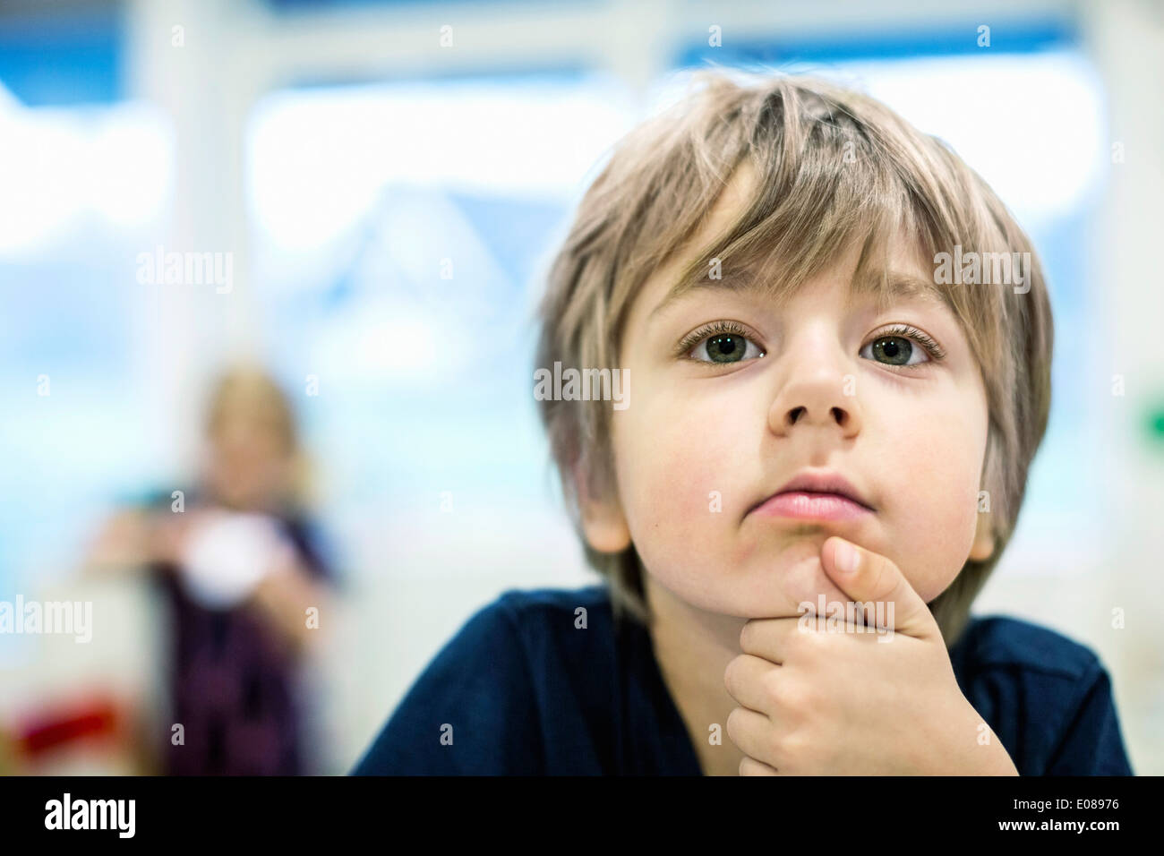 Little boy looking away in kindergarten Stock Photo - Alamy